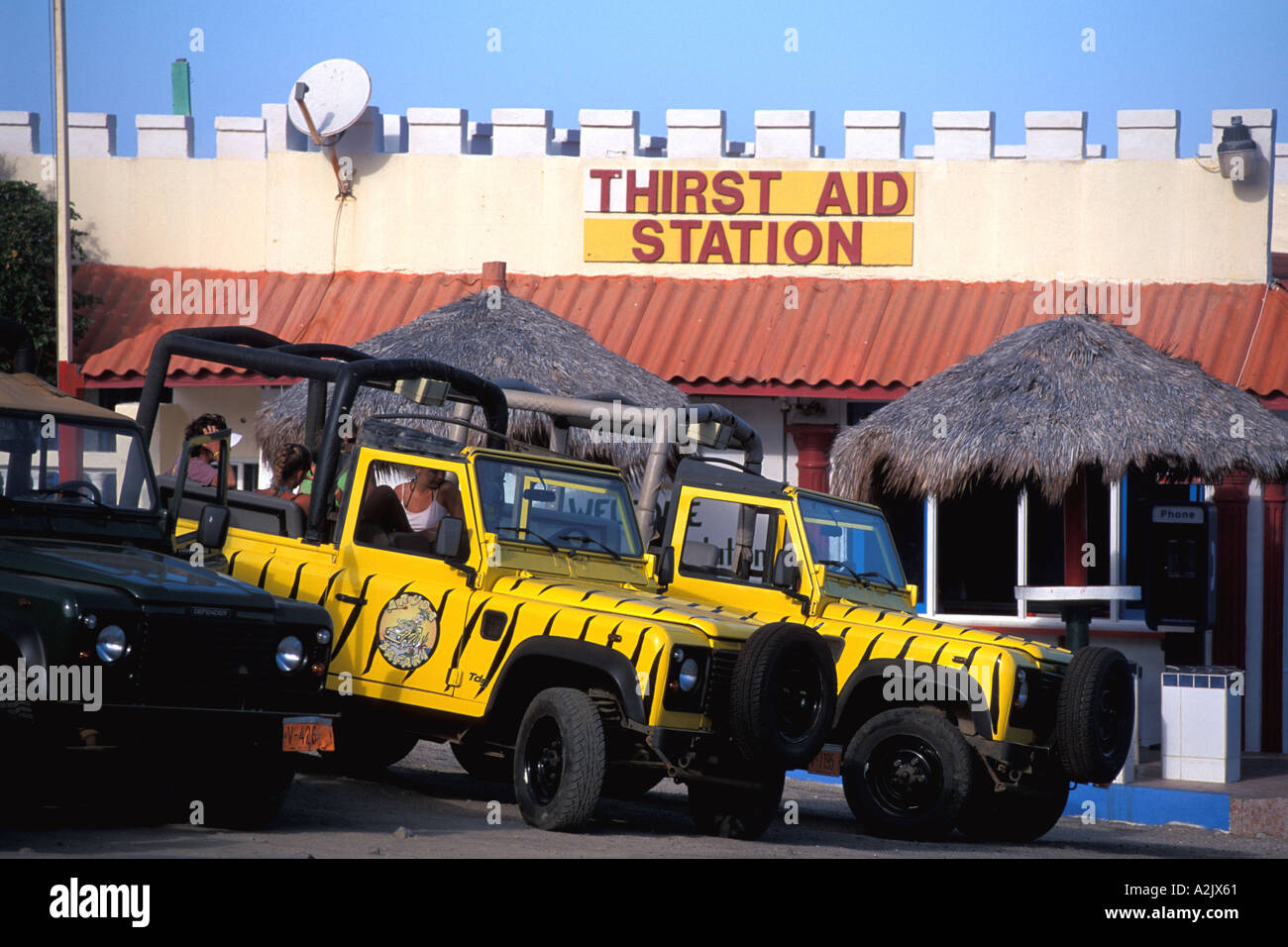 Aruba dune buggies at Thirst Aid Station at Natural Bridge Stock Photo ...