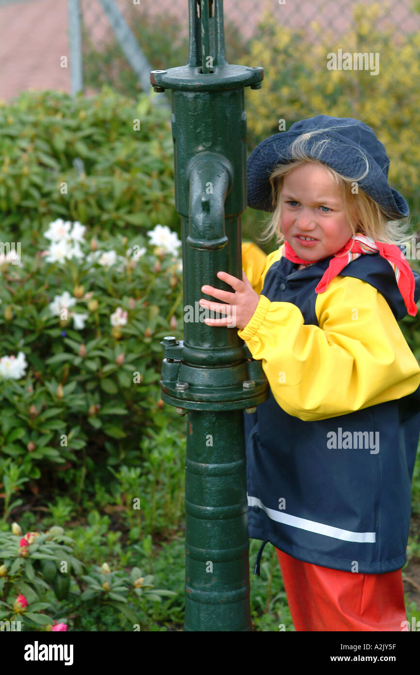 children play in sludge Stock Photo - Alamy