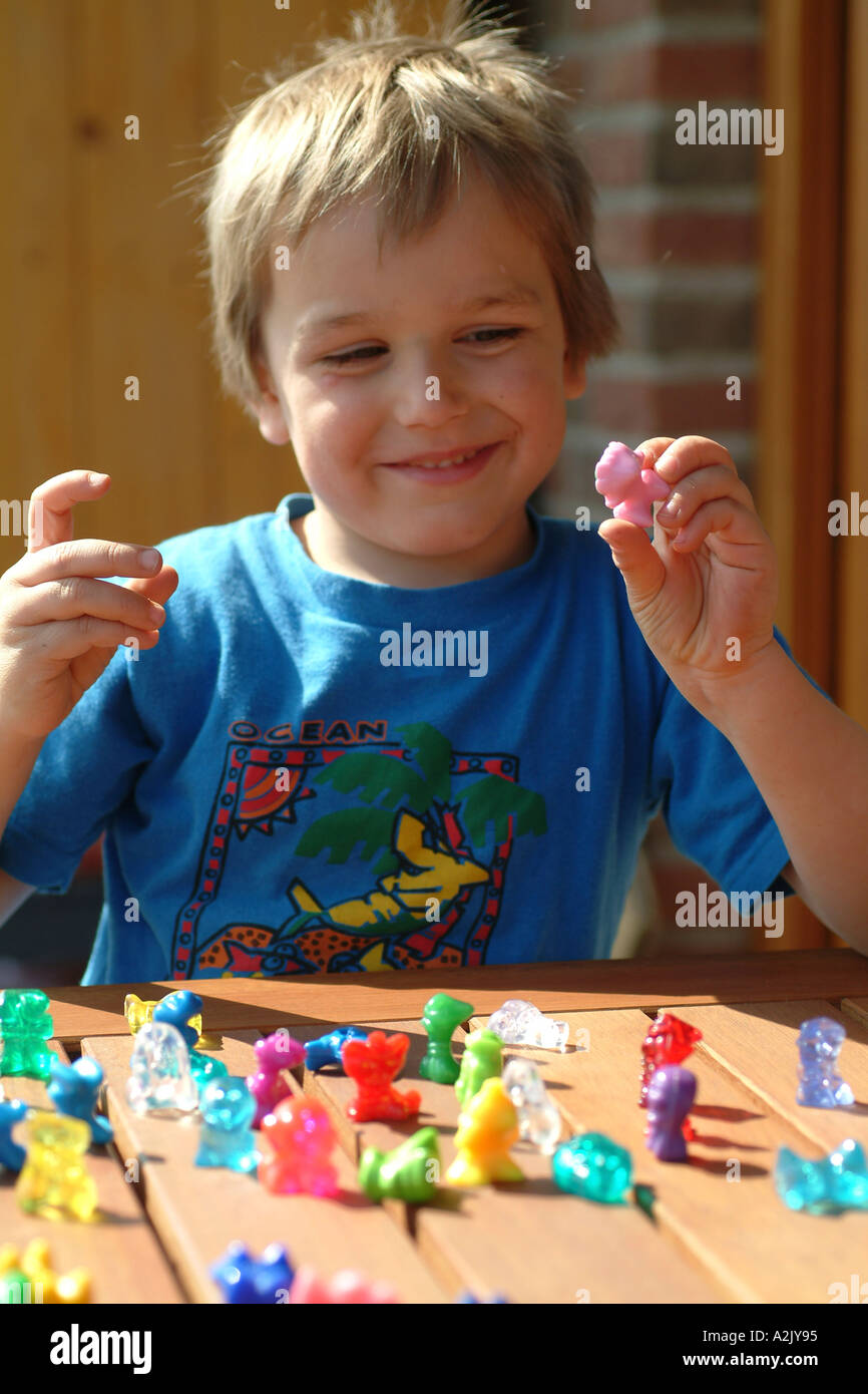 3 toy figures hi-res stock photography and images - Alamy