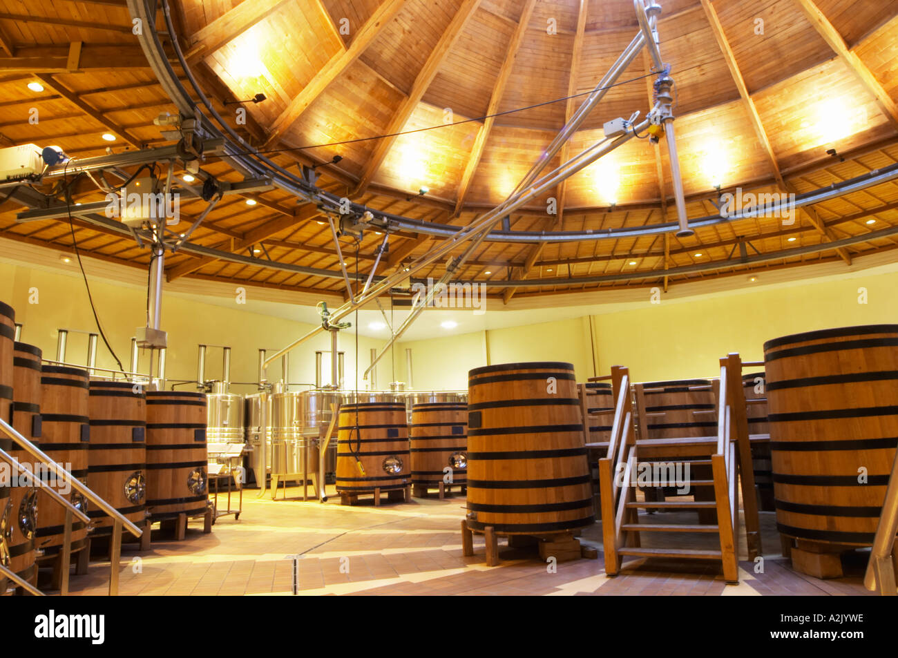 The winery with wooden and stainless steel fermentation vats. It is ...