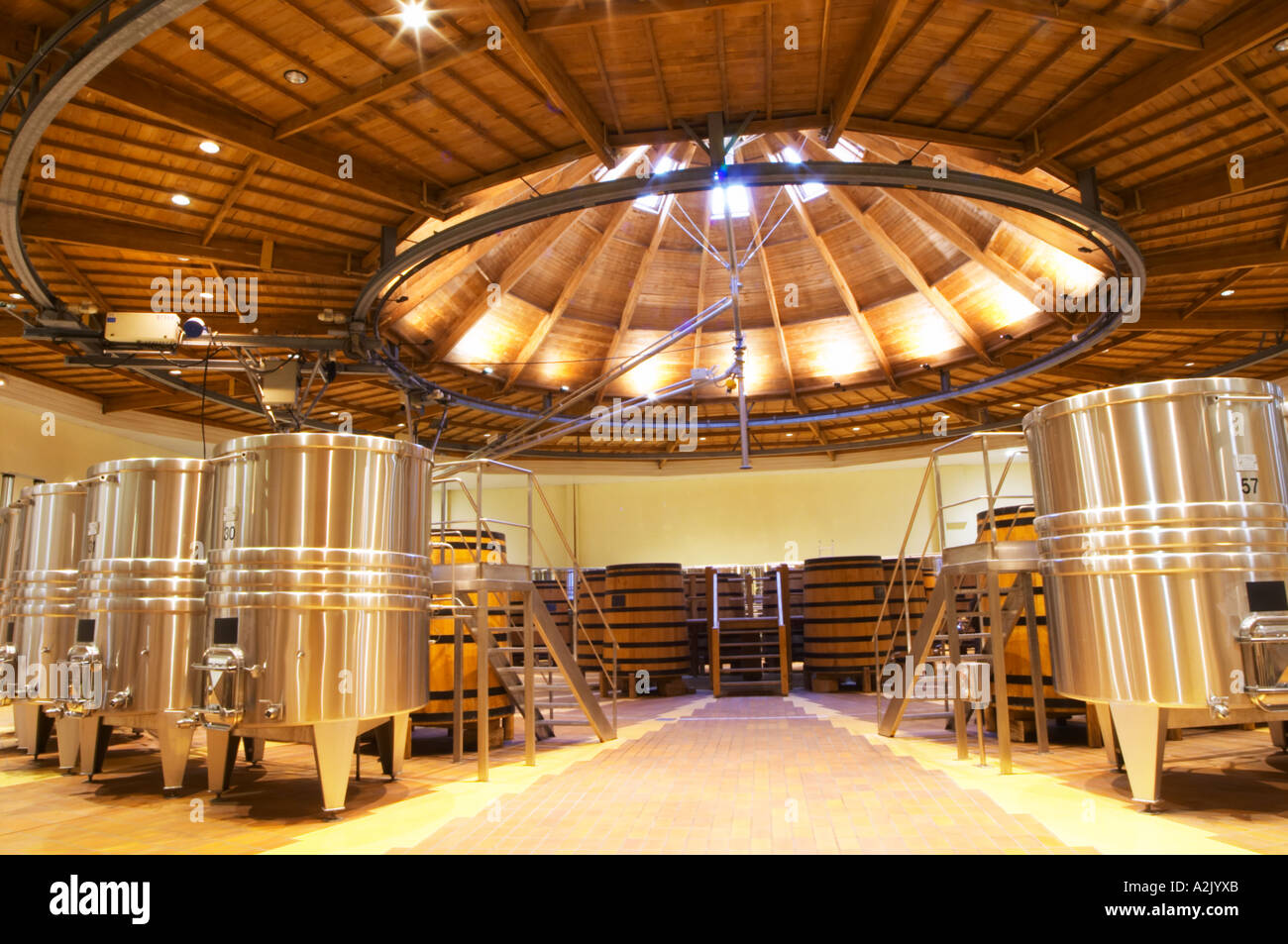 The winery with wooden and stainless steel fermentation vats. It is ...