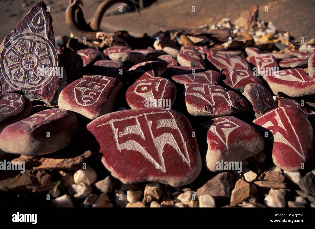 Traditional carved prayer stones hi-res stock photography and images ...