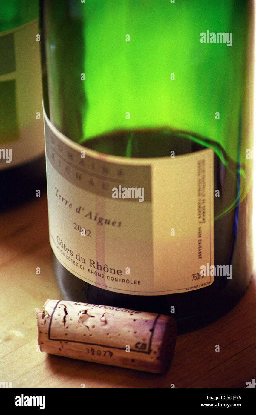 An almost empty bottle of red wine Domaine Marcel Richaud Terre d ...