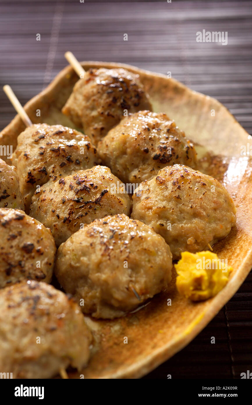 Japanese Tsukune Skewered chicken meat balls Stock Photo - Alamy
