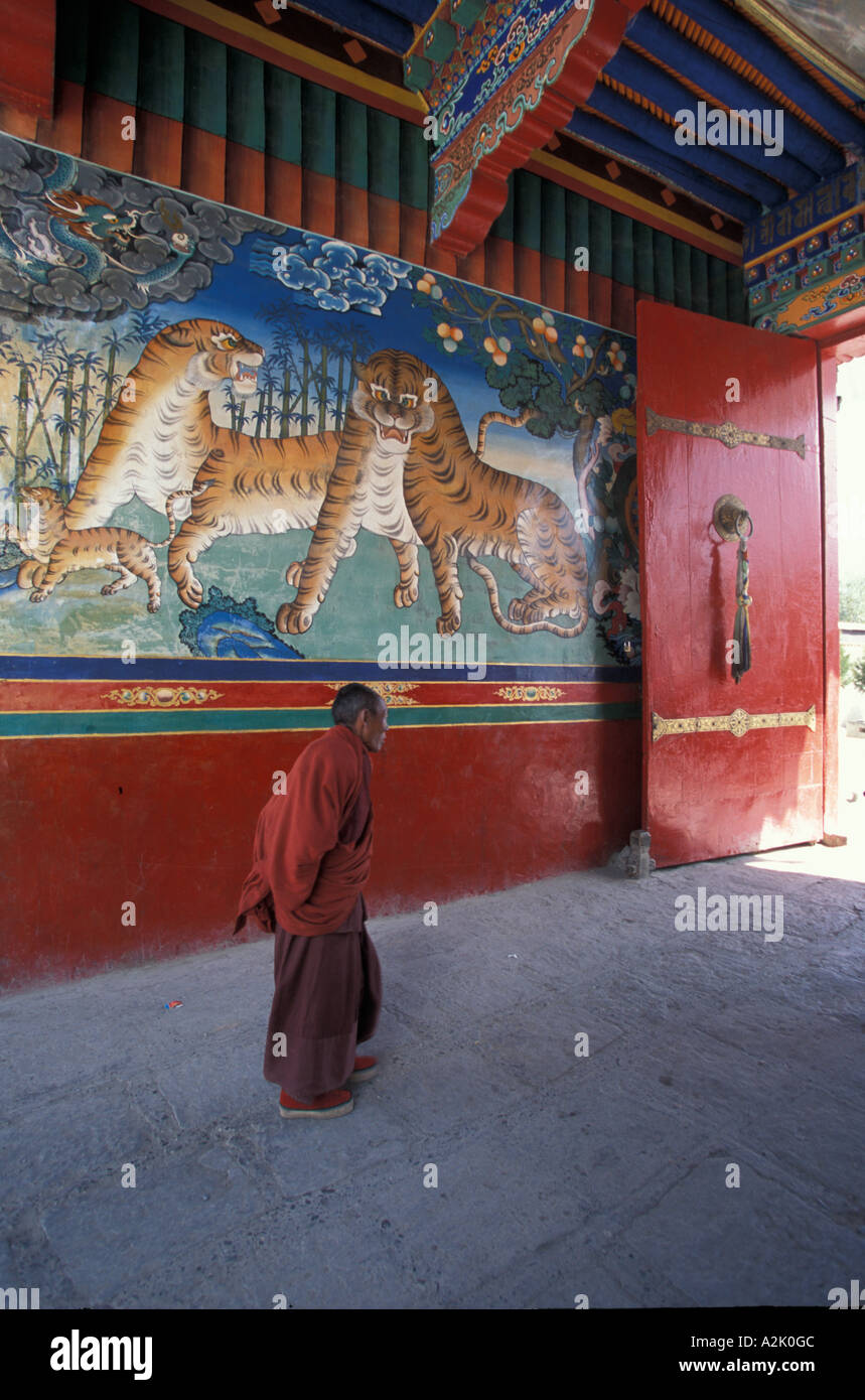 Tibet- Shigatse. Monk entering Tashilumpo monastery Stock Photo - Alamy