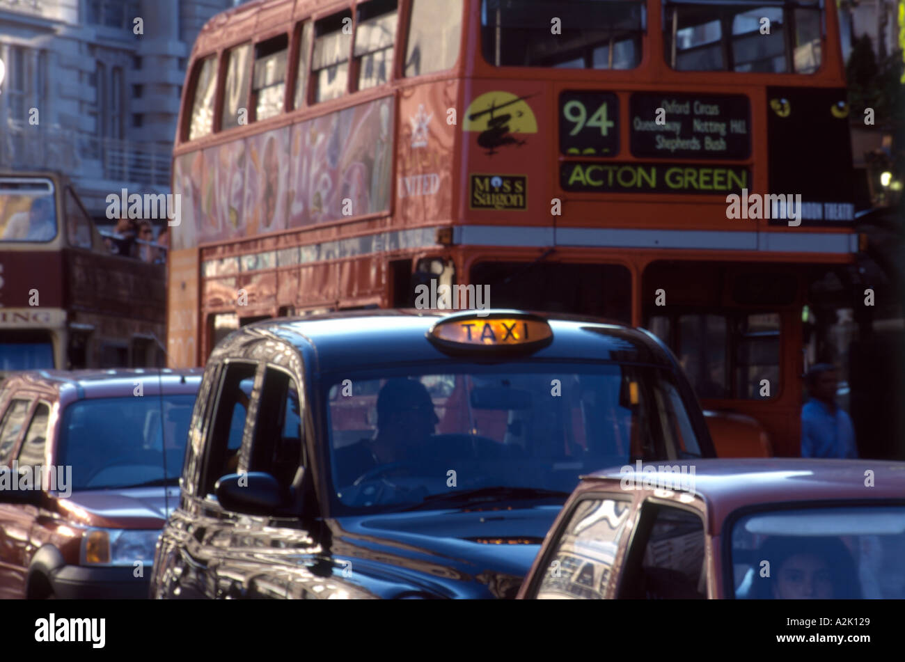 Red buses taxis trafalgar square hi-res stock photography and images ...