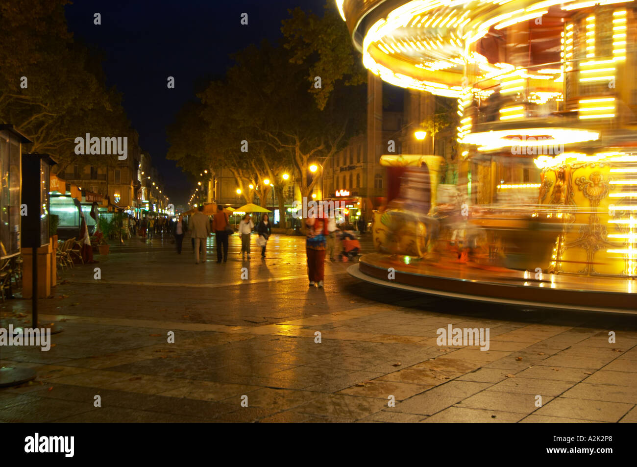 The place de l'Horloge main town square in Avignon at night with a ...