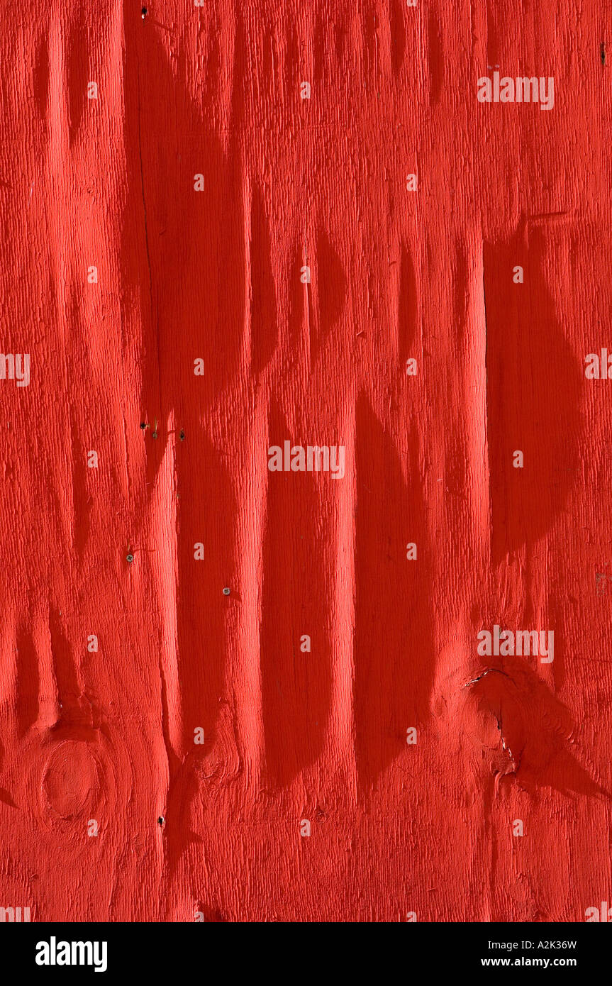 hoarding painted red Stock Photo - Alamy