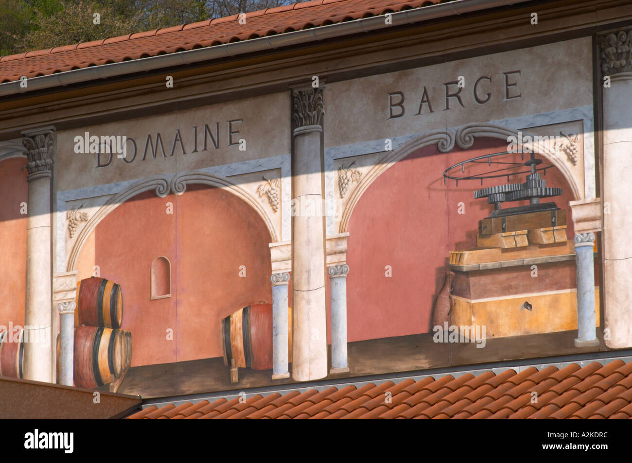 The winery at Domaine Barge with wall fresco paintings showing barrels ...