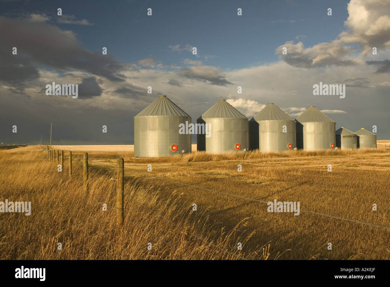Canada, Alberta, Stand Off: Landscape with Dramatic Sky Grain Silos ...