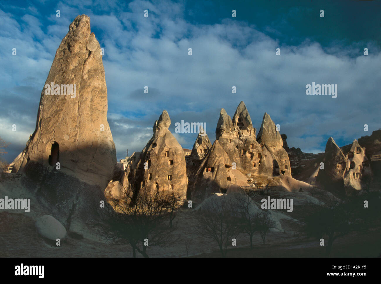Uchisar fortress homes cut into naturally formed volcanic pinnacles ...