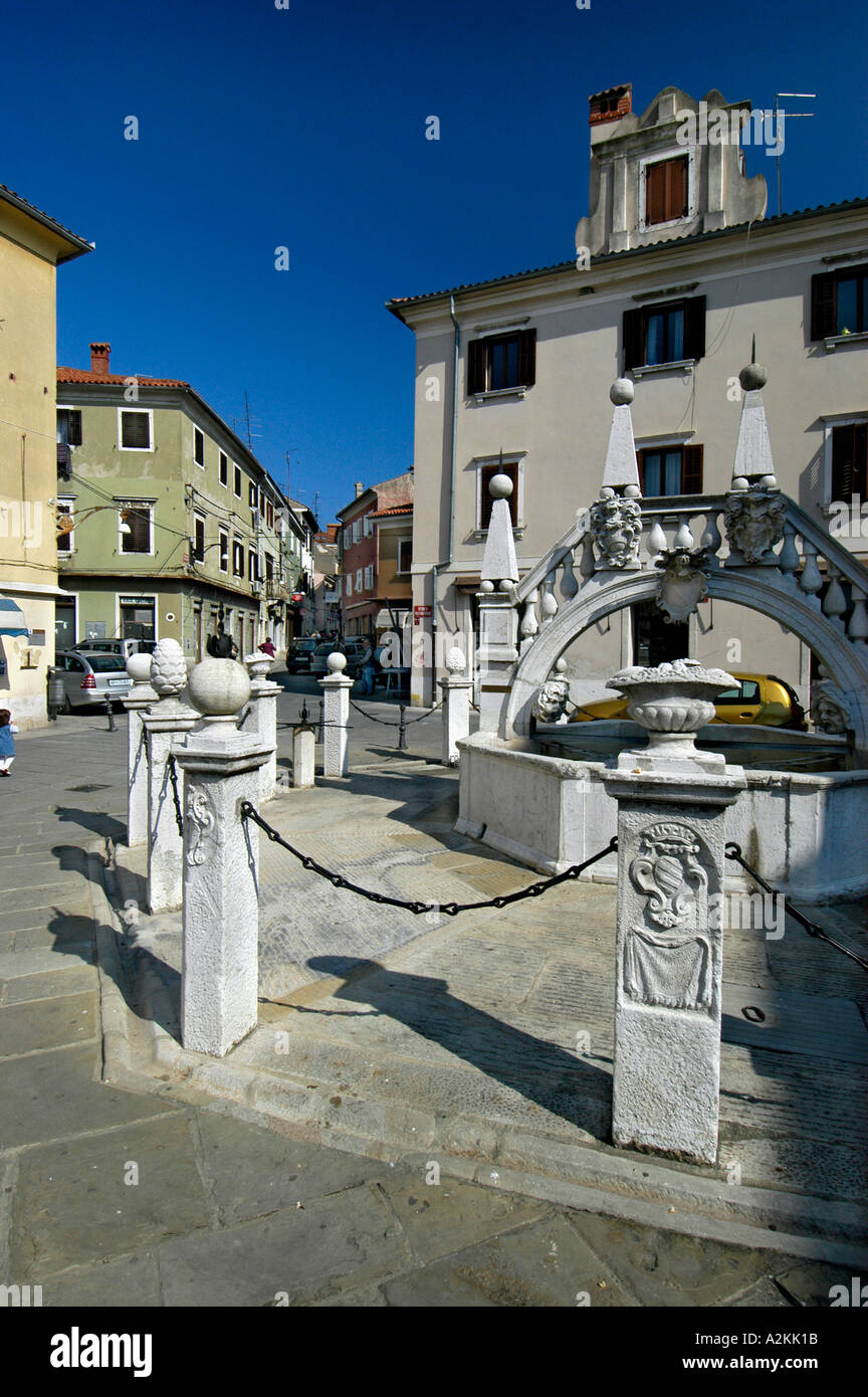 square with fountain in the historic center of Koper or Capodistria ...