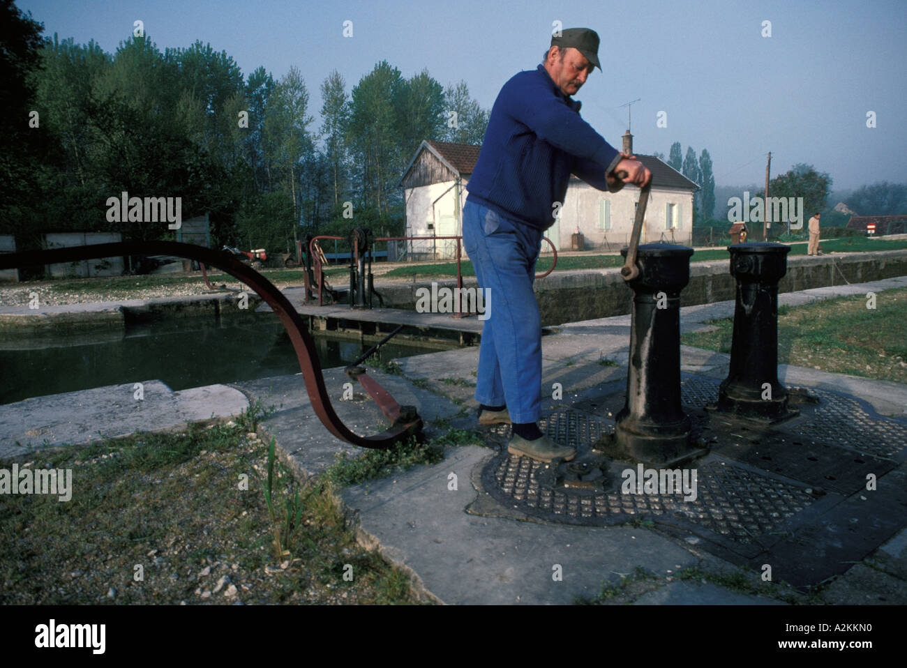 Person opening canal lock hi-res stock photography and images - Alamy