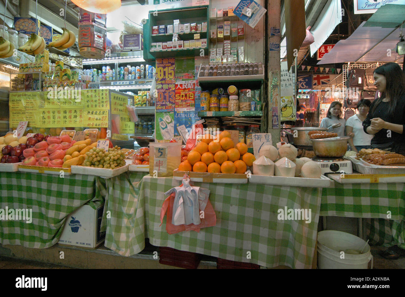 fast food stand or open kitchen at a night market in Kowloon Stock ...