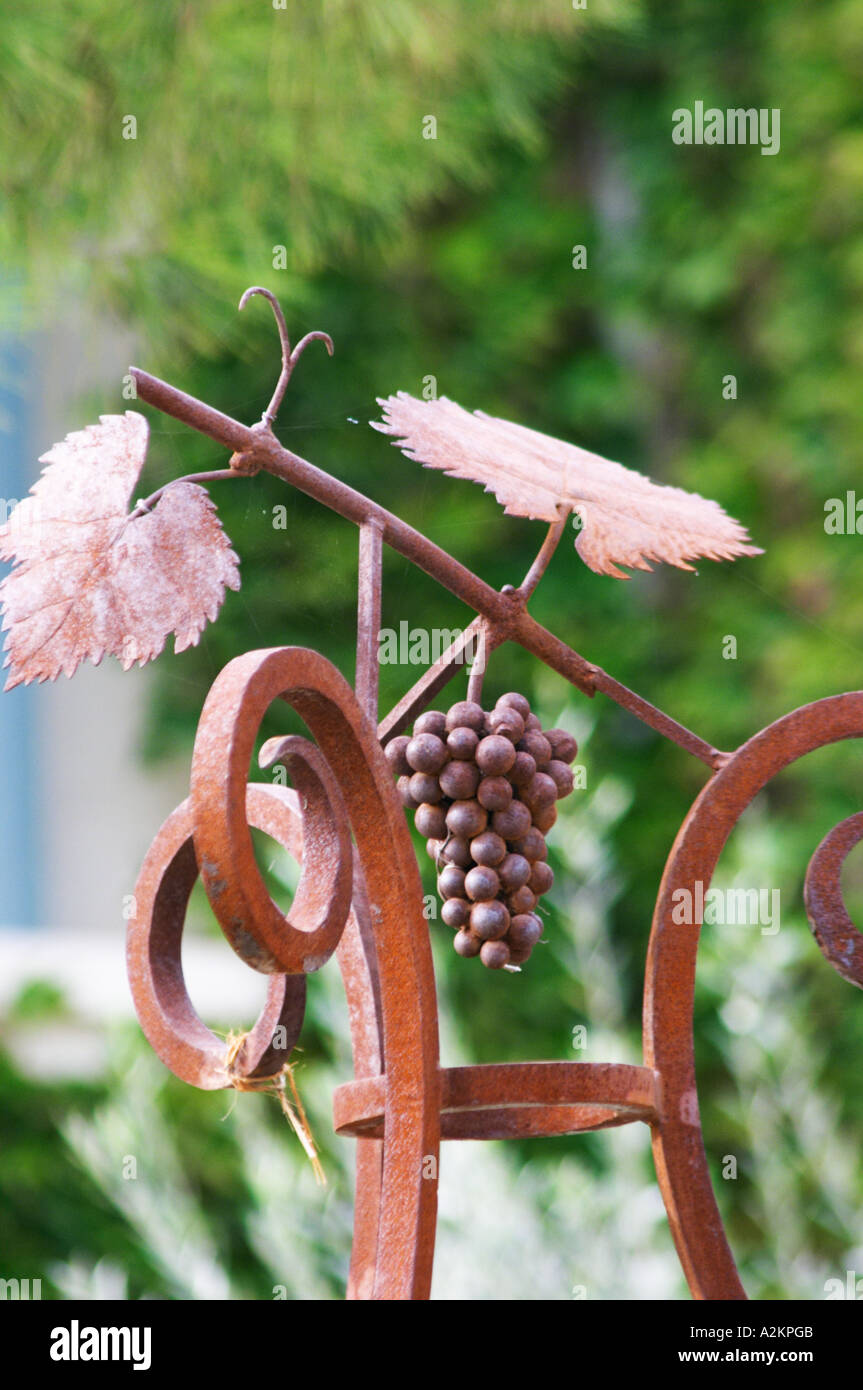 Wrought iron decoration: a grape bunch leaves and vine. Chateau de ...