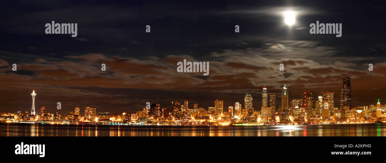 Seattle skyline Space Needle and full moon reflecting in Elliot Bay ...