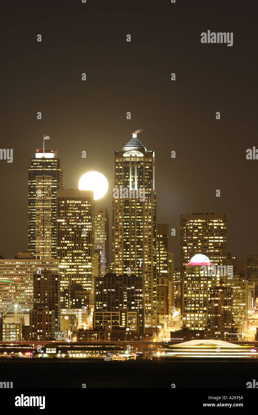 Full moon rising over Seattle city skyline at night Seattle Washington ...