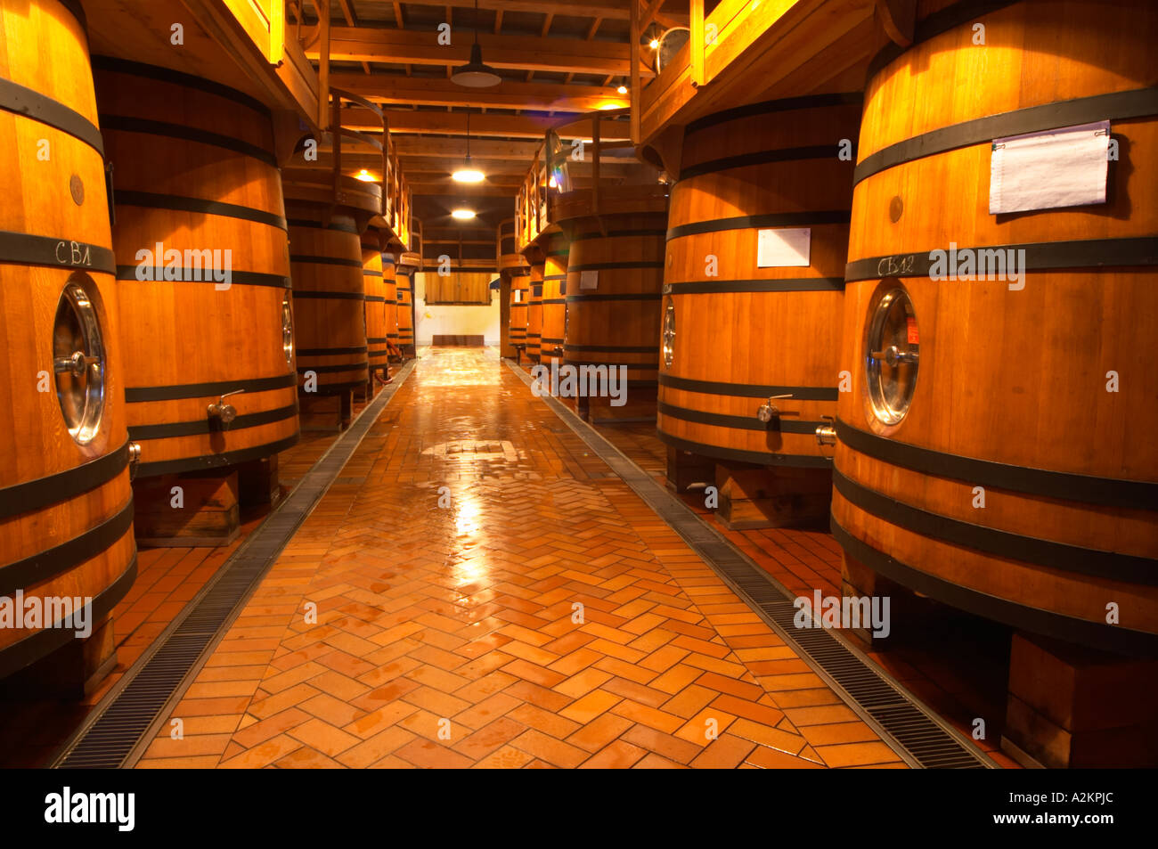 The winery with large wooden fermentation vats. Chateau de Beaucastel ...