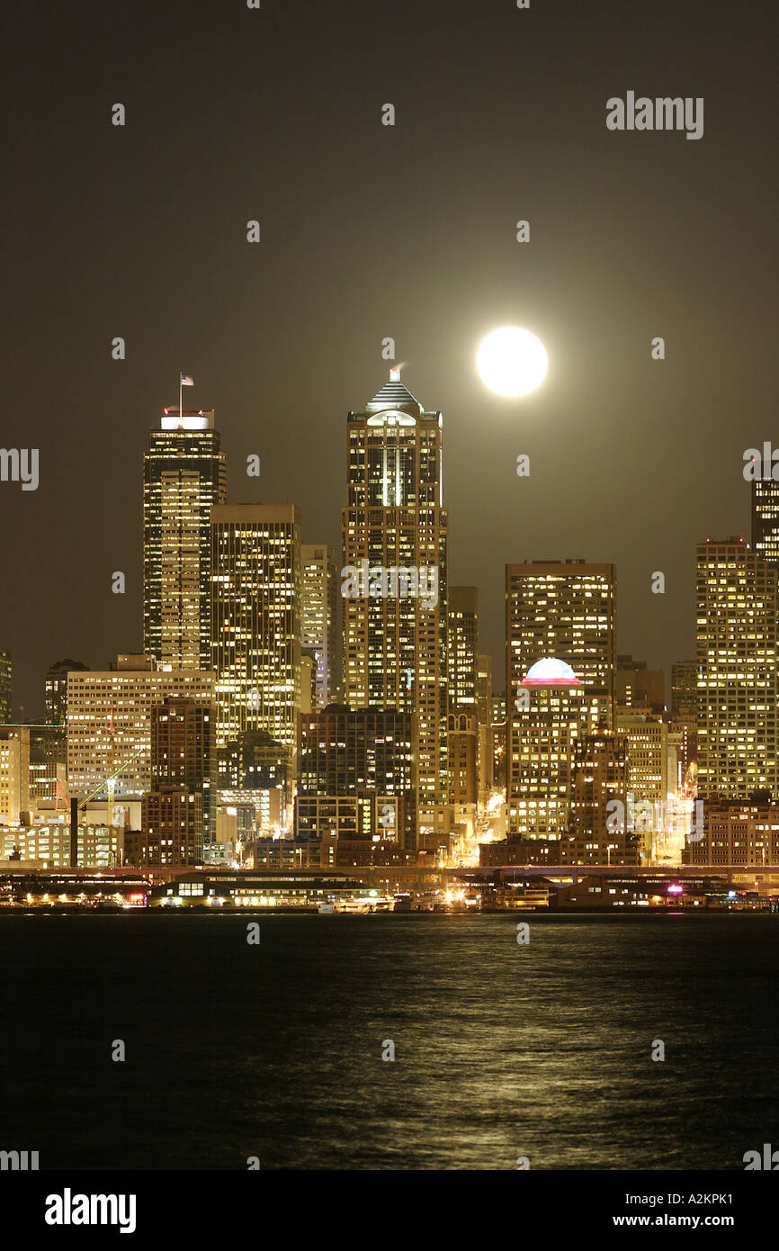 Full moon rising over Seattle city skyline at night Seattle Washington ...