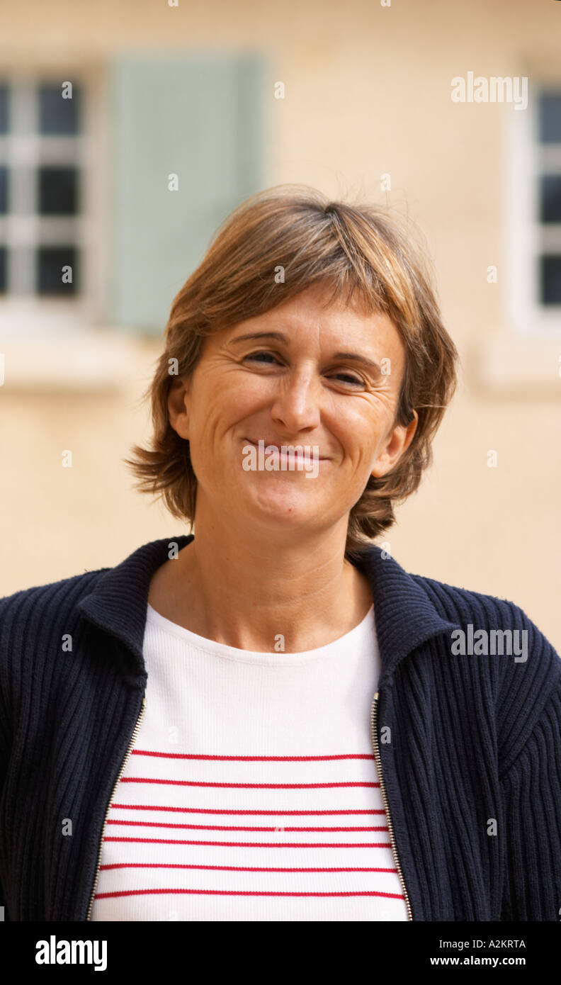 Anne Collard, owners, in the courtyard in front of the symbolic sun ...