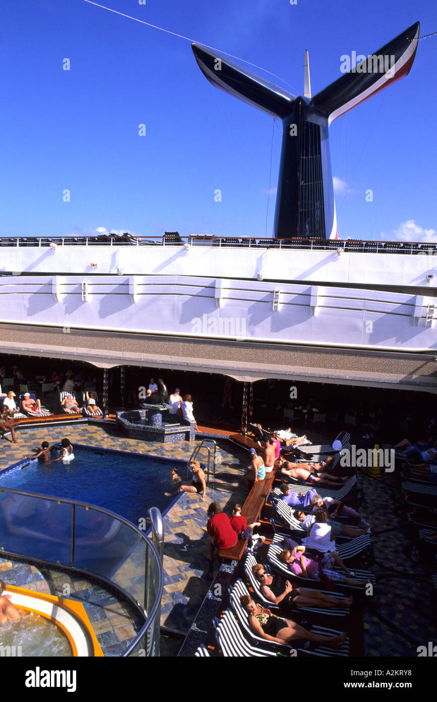 Crowded Carnival Liberty Cruise ship in the Caribbean with everyone ...