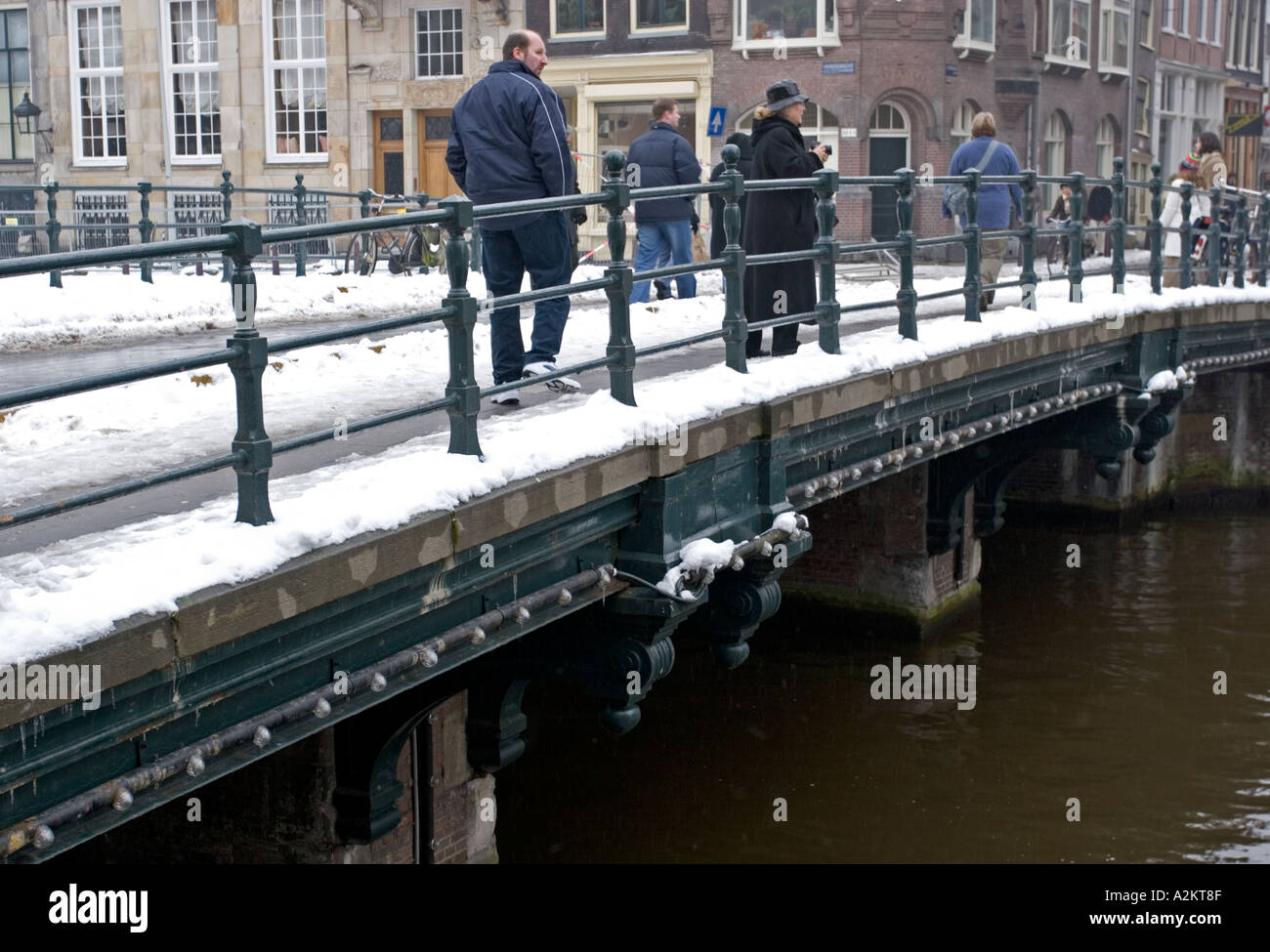 Winter scene from Amsterdam canal bridge Stock Photo - Alamy