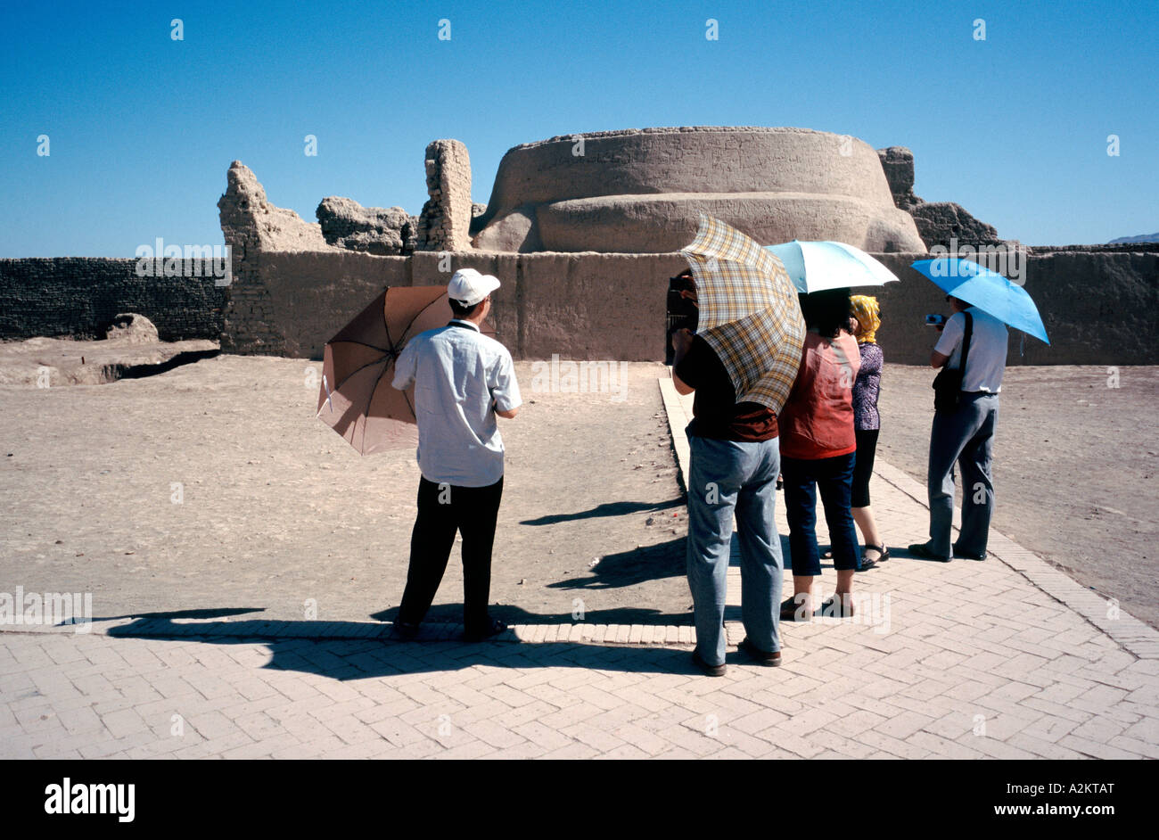 Group of Chinese tourists at the ruins of the ancient city of Gaochang ...