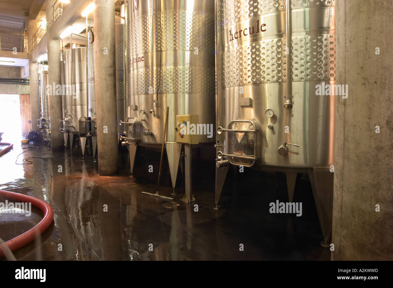 The vat hall with stainless steel fermentation tanks, each with its own ...