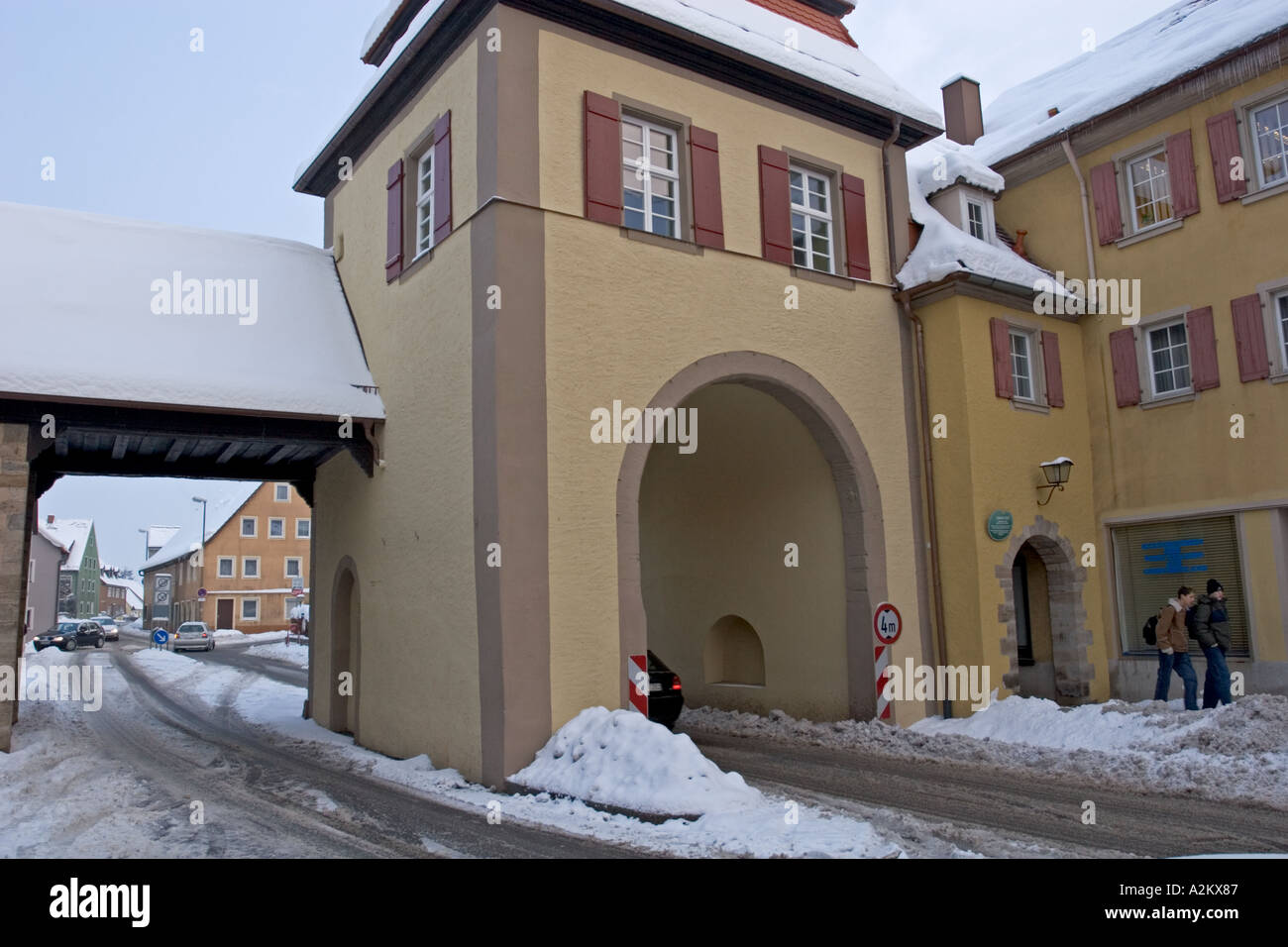 Snowy street and gate in Feuchtwangen Bavaria Germany Stock Photo - Alamy