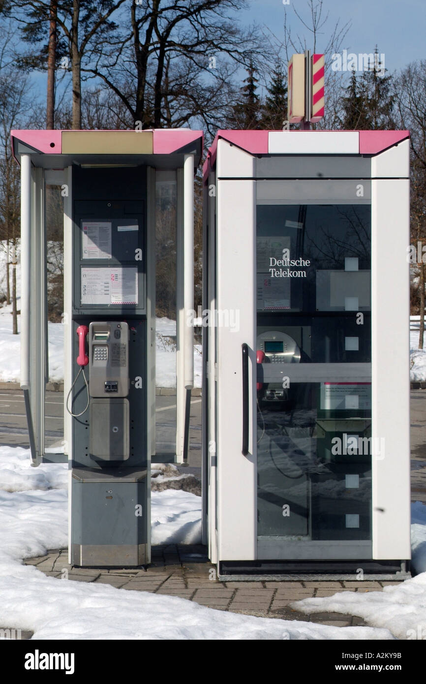 Two German telephone boxes surrounded by snow Stock Photo - Alamy