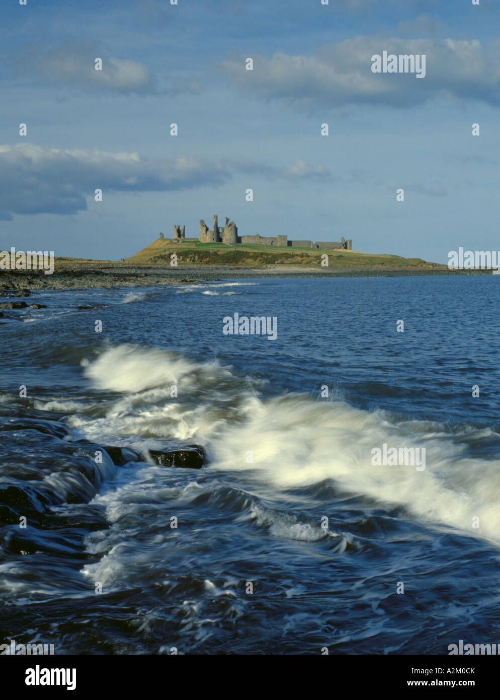 Dunstanburgh Castle ruins, Castle Point, near Craster, Northumberland ...
