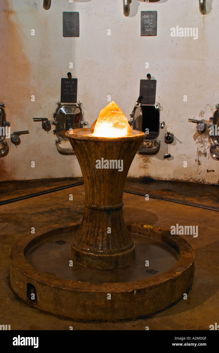 Concrete fermentation vats and the mystic fountain with a big crystal ...
