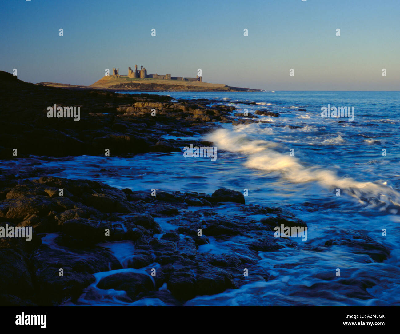 Dunstanburgh Castle ruins, Castle Point, near Craster, Northumberland ...