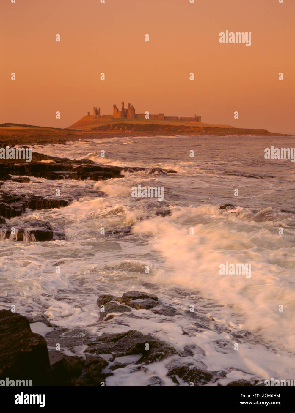 Dunstanburgh Castle ruins, Castle Point, near Craster, Northumberland ...