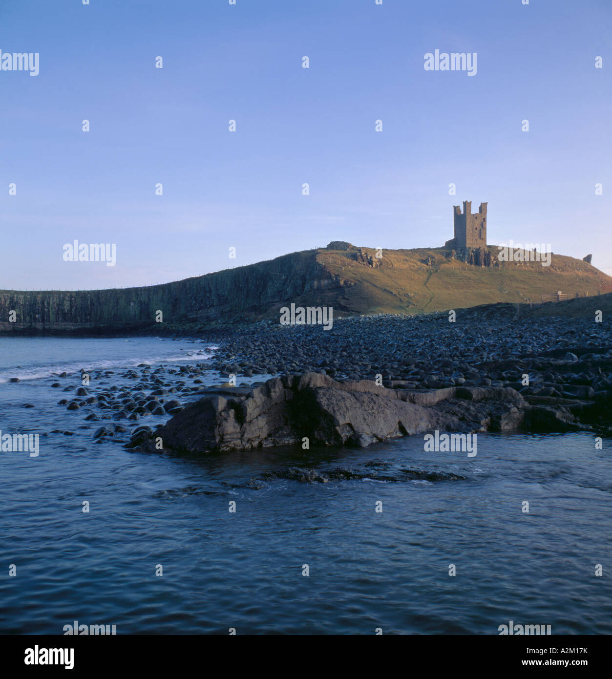 Lilburn Tower, Dunstanburgh Castle ruins, from Embleton Bay ...