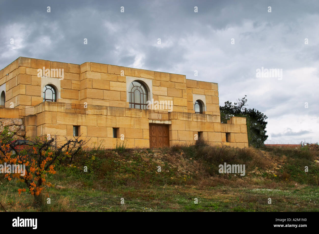 The imposing winery building built from gigantic stone blocks of ...