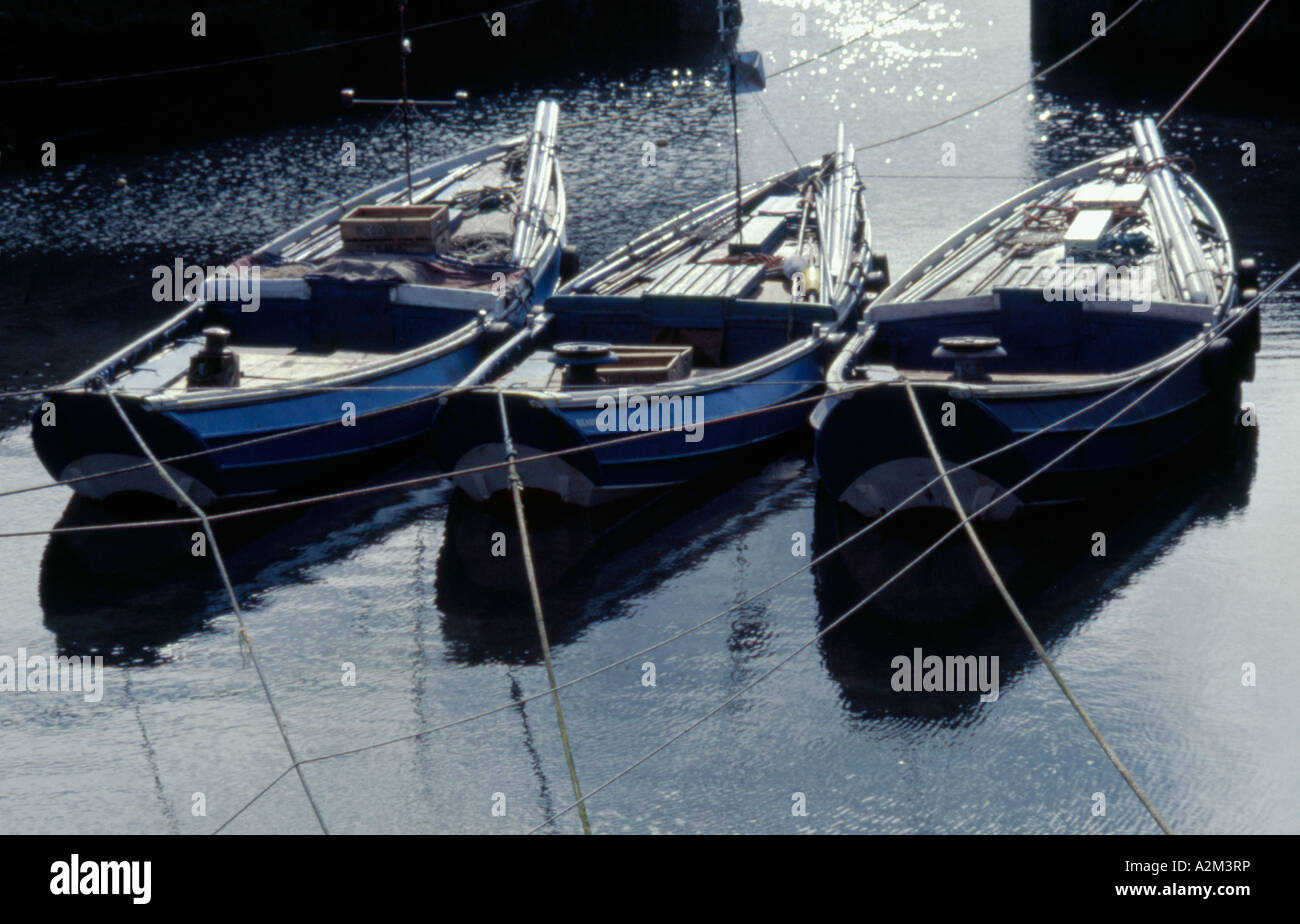 Wooden coble fishing boats, Beadnell, Northumberland, England, UK Stock ...