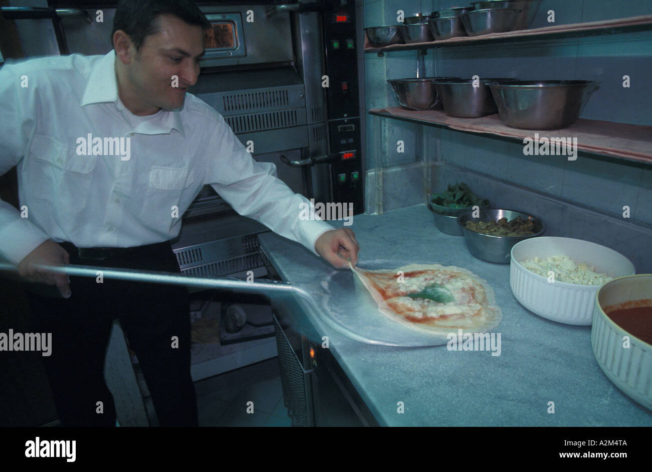 Europe, Italy, Naples, Trattoria Castel Nuovo, Pizza chef (MR Stock ...