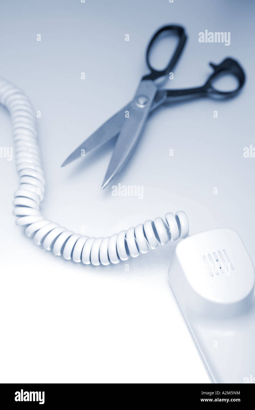 Scissors and telephone receiver Stock Photo - Alamy
