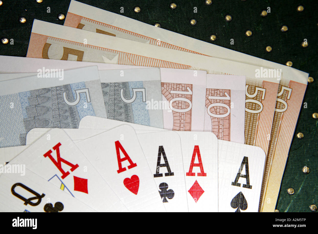 Playing cards and Euros Stock Photo - Alamy