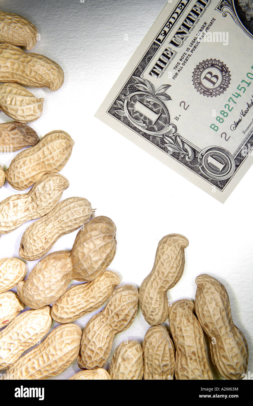 Peanuts and American banknote Stock Photo - Alamy