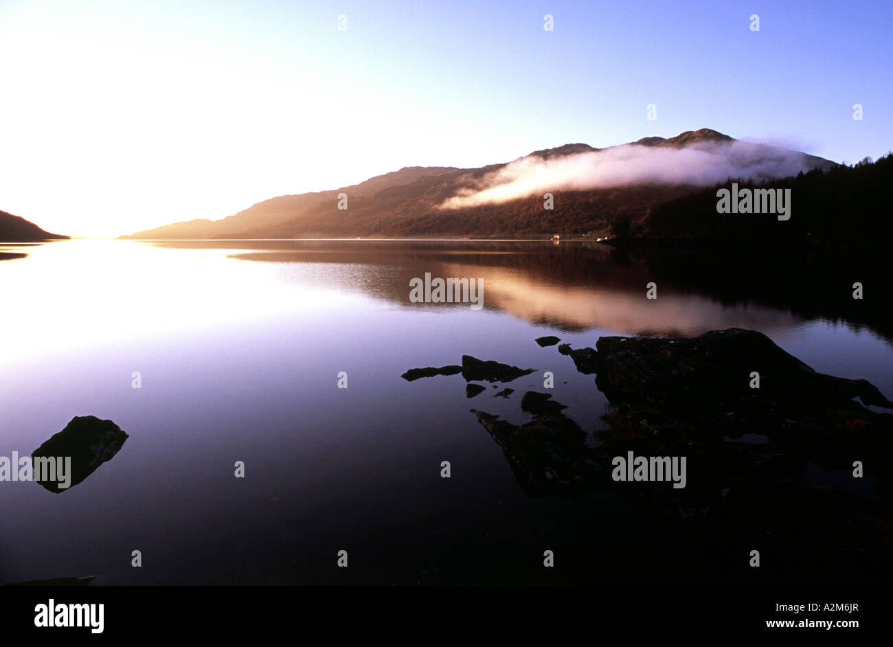 Still dawn over Loch Lomond, Scotland Stock Photo - Alamy
