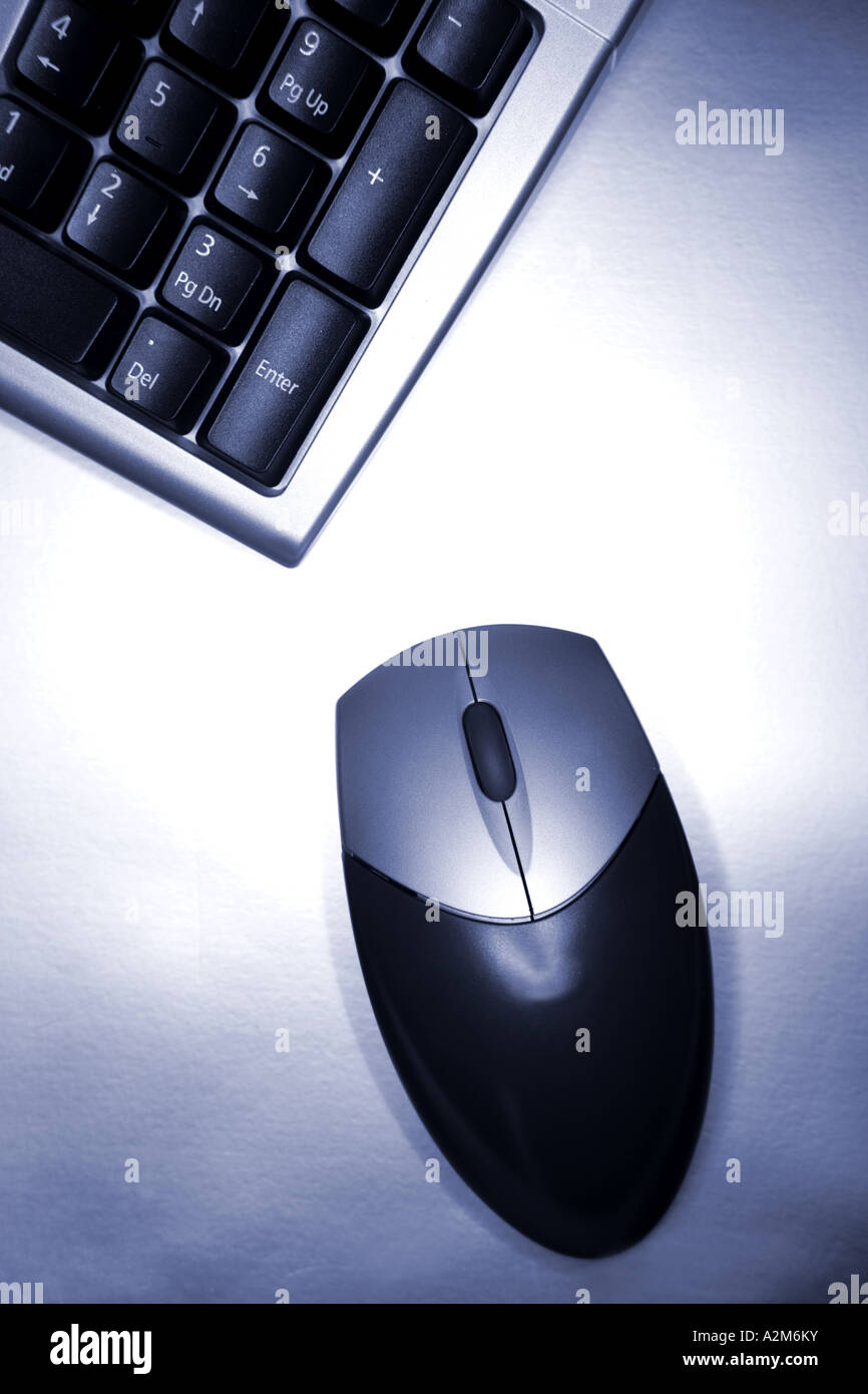 Computer keyboard and cordless mouse Stock Photo - Alamy