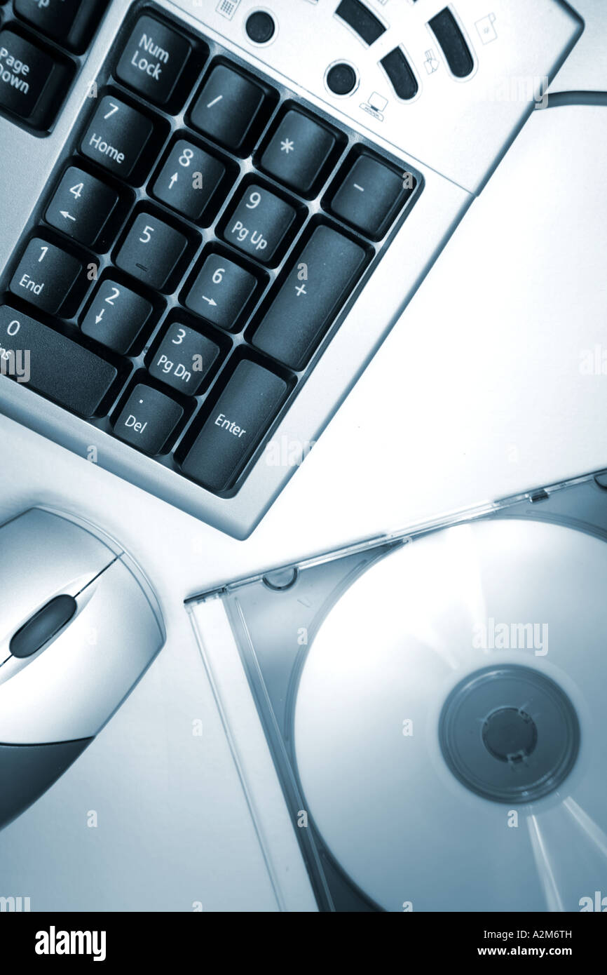Computer keyboard, mouse and CD Stock Photo - Alamy
