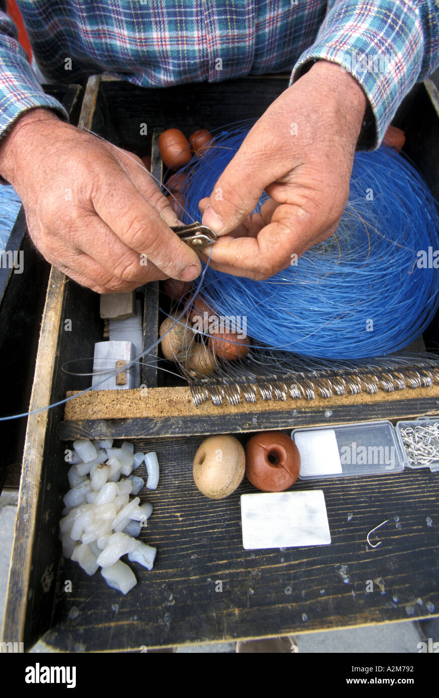Fisherman at work Stock Photo - Alamy