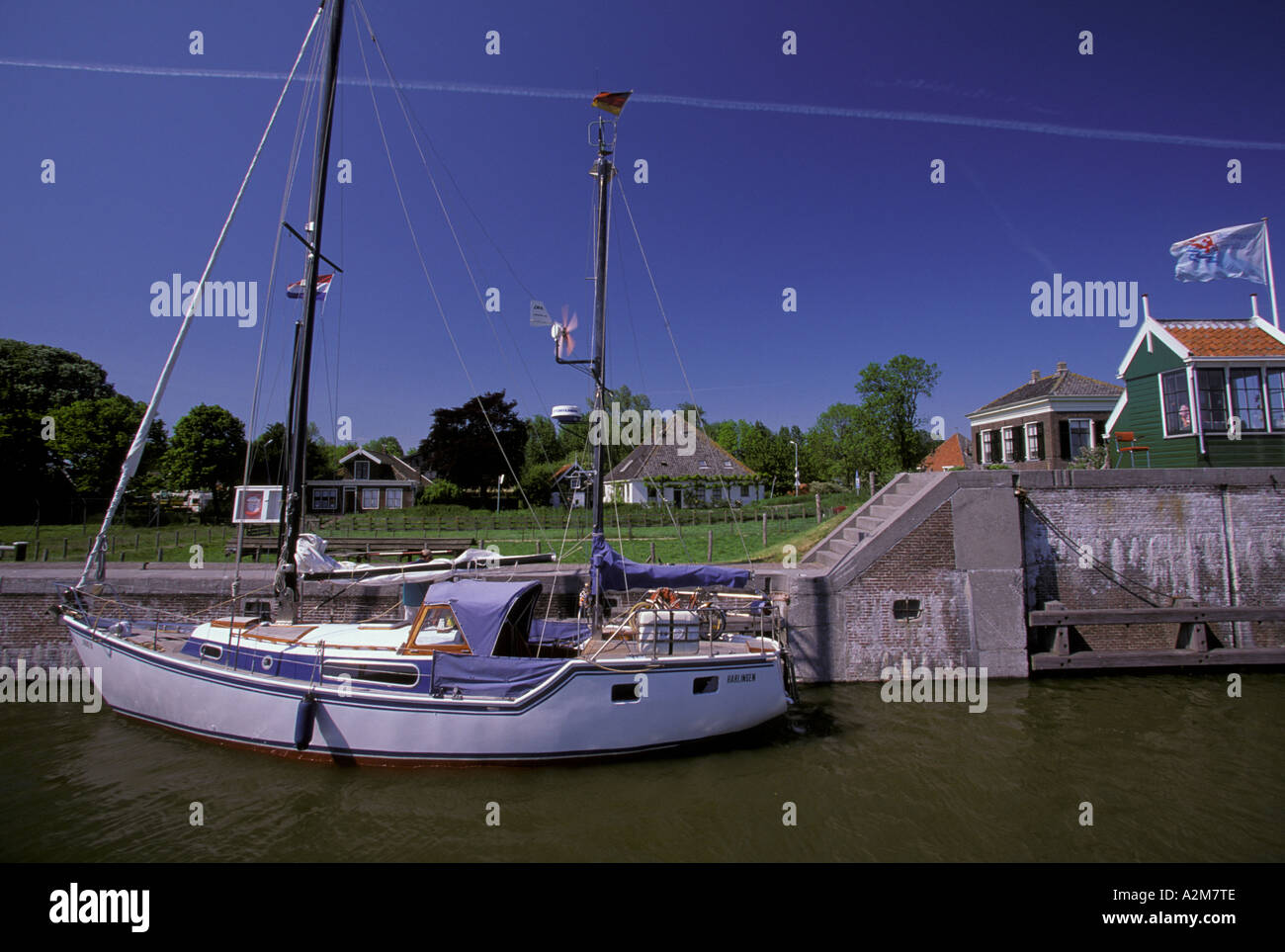 Europe, Netherlands, Volendam. Boat and Sluice gates Stock Photo - Alamy