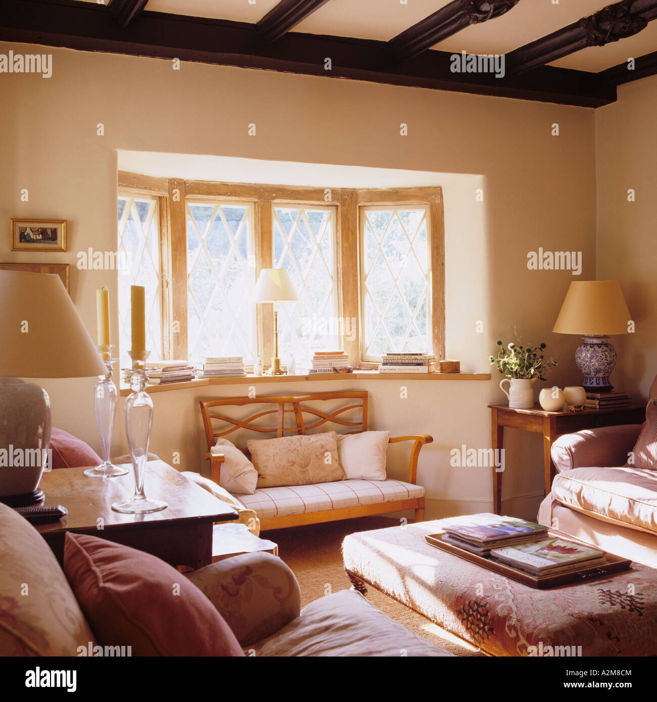 Cosy sitting room with bay window and beamed ceiling in converted ...