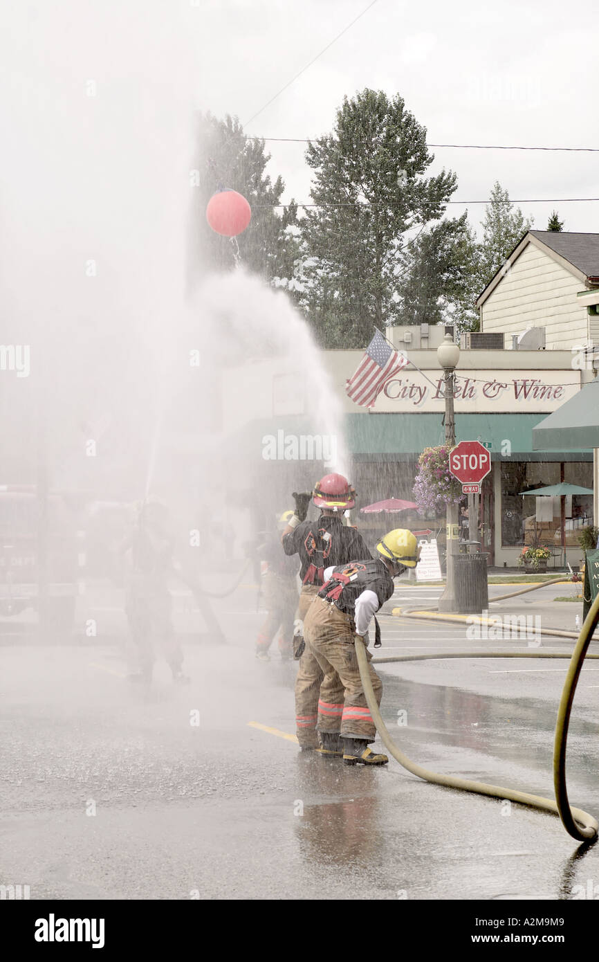 Firemen competing in Firefighters Waterball event during Kla Ha Ya Days ...