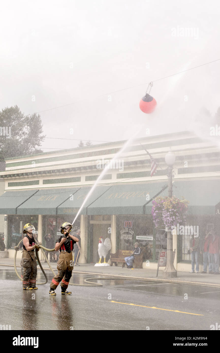 Firemen competing in Firefighters Waterball event during Kla Ha Ya Days ...
