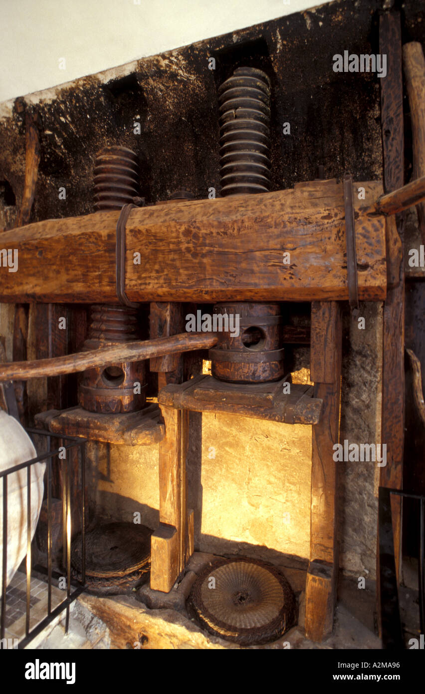 Ancient press in San Carlo farm holidays Stock Photo - Alamy
